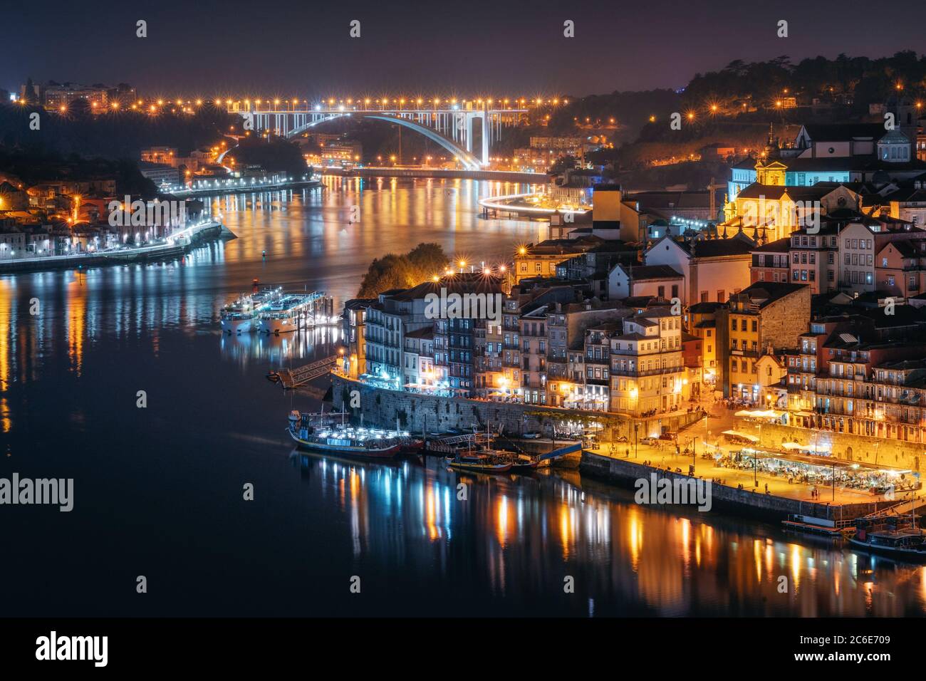Night city skyline of Porto from Luis I bridge over Douro river ...