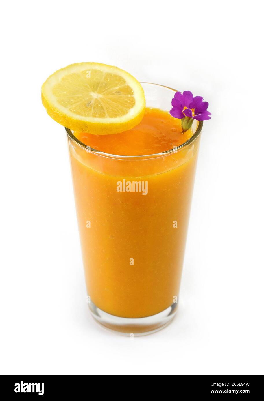 Glass of milkshake or cocktail isolated on white background. Mango ...