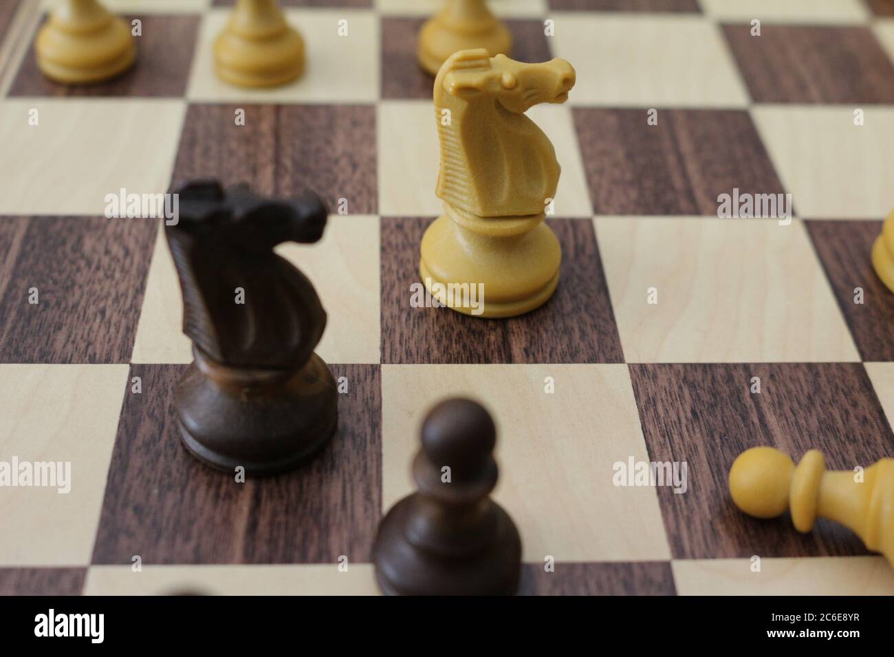 Chess game, chessboard and wooden pieces Stock Photo - Alamy