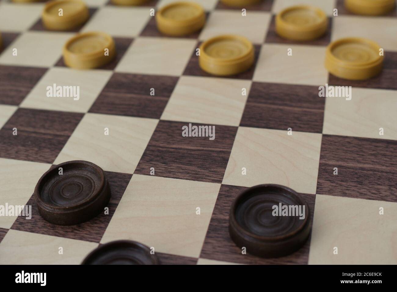 Game of checkers, ancient strategy game consisting of a chessboard and ...