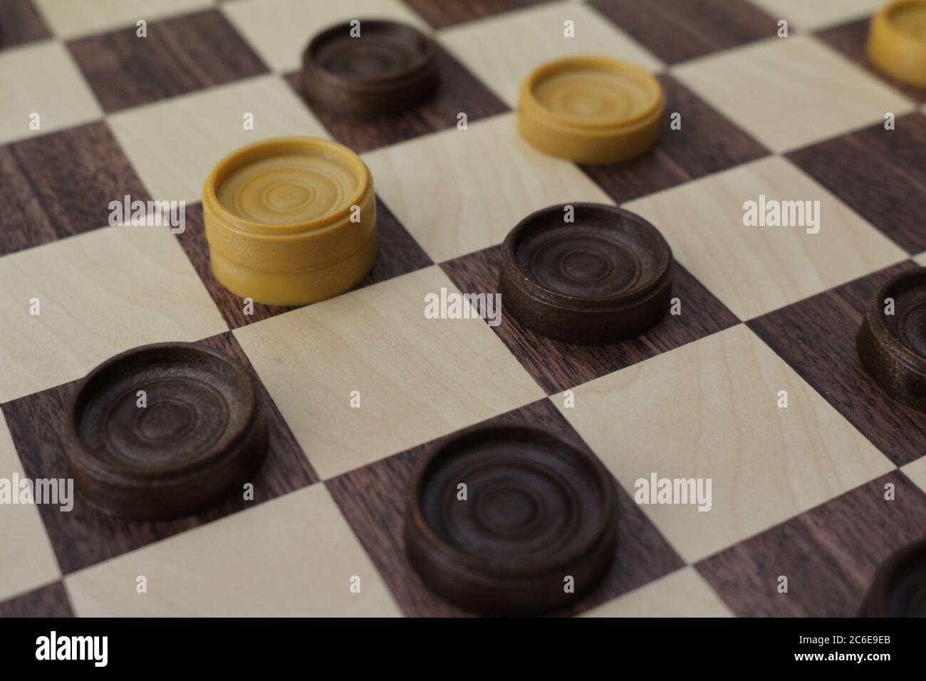 Game of checkers, ancient strategy game consisting of a chessboard and ...