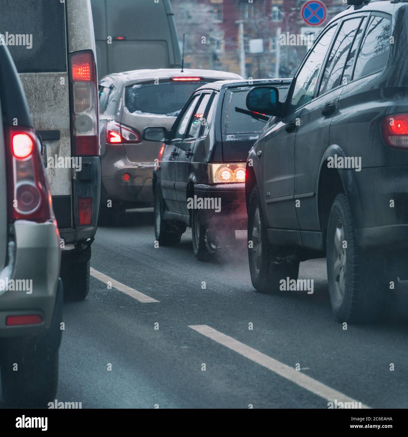 Cars standing in a traffic jam on a city street Stock Photo - Alamy