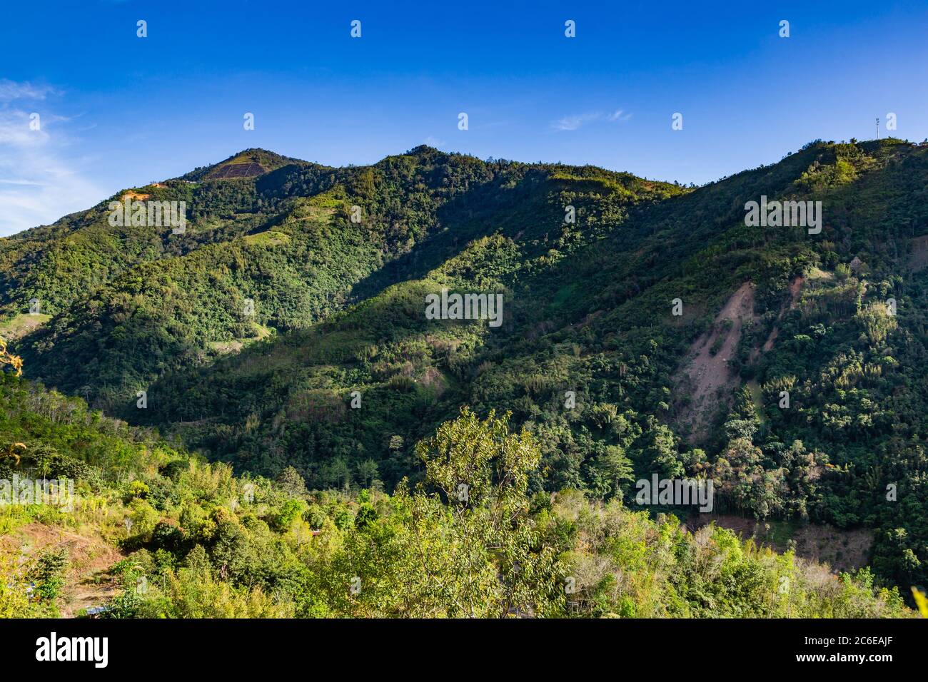 the serene view of hills in the valley of Kampung Kiau, Bundu Tuhan ...
