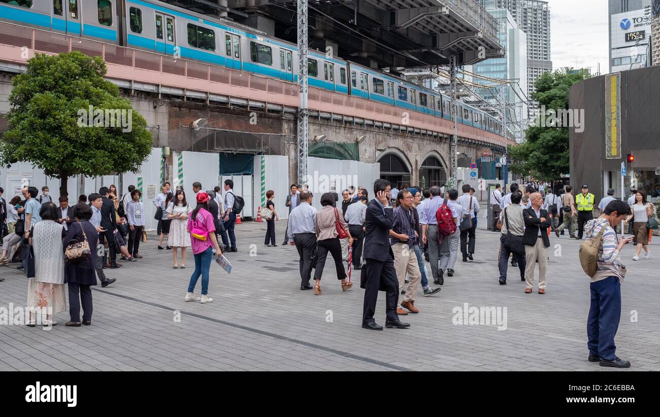 Crowd of office worker at Shimbashi Station, Tokyo, Japan after office ...