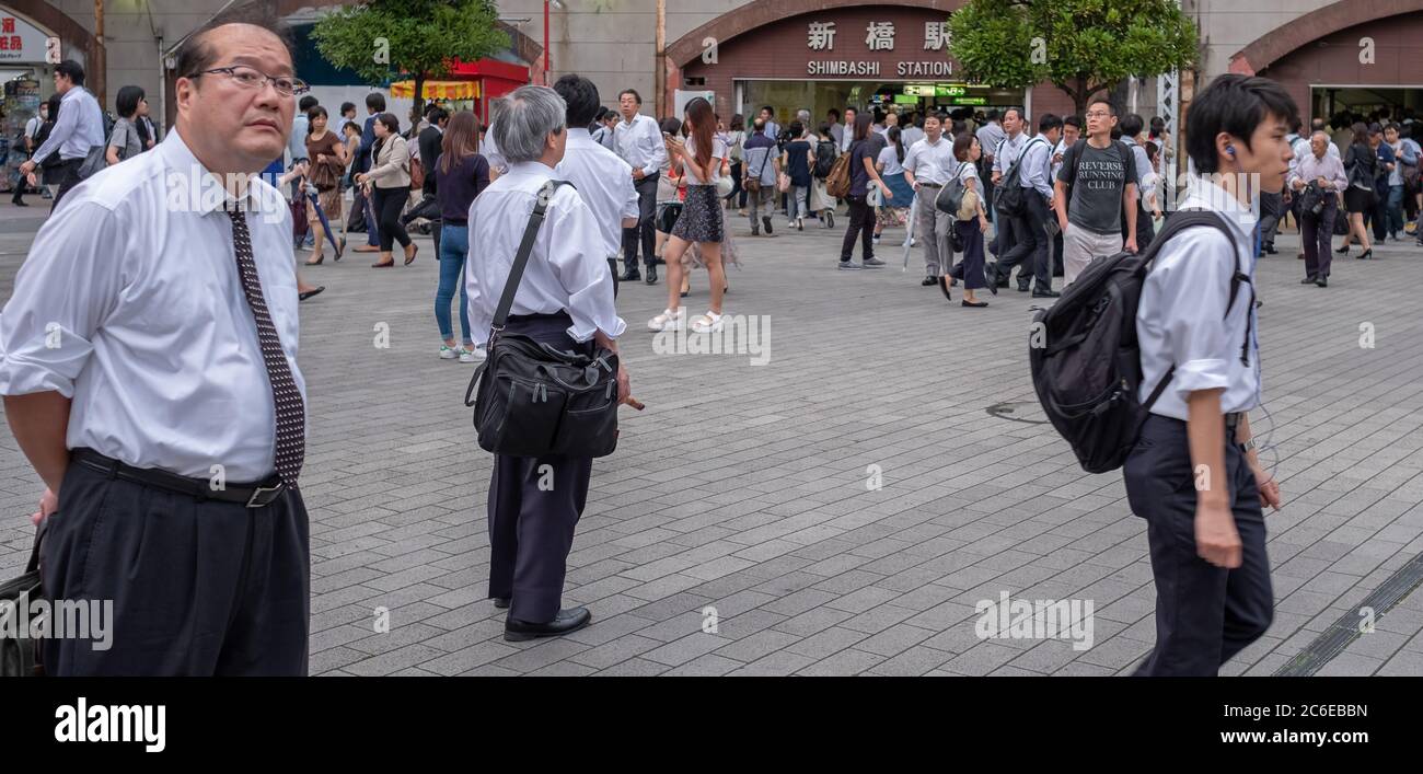 Crowd of office worker at Shimbashi Station, Tokyo, Japan after office ...