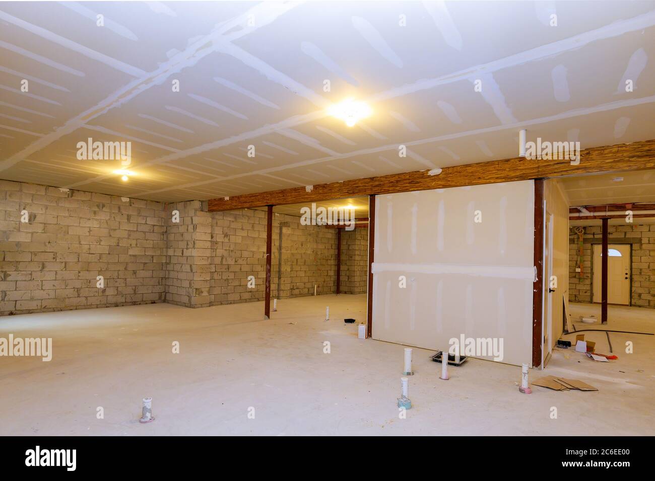 New residential construction home framing with basement unfinished view ...