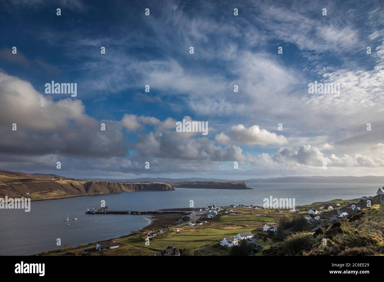 View from the surrounding hills of the bay and small port of Uig on the ...