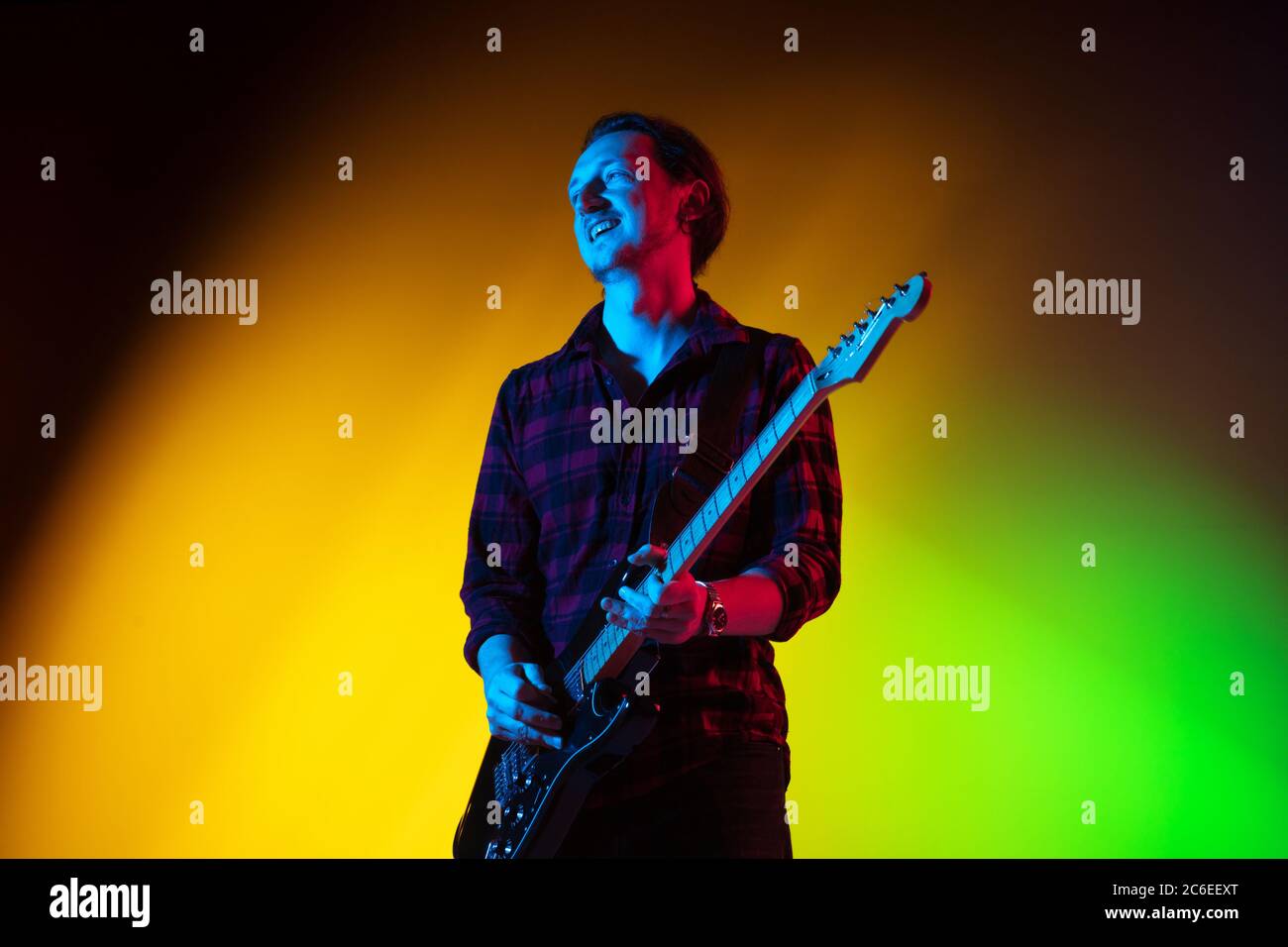 Summertime. Young inspired and expressive musician, guitarist ...