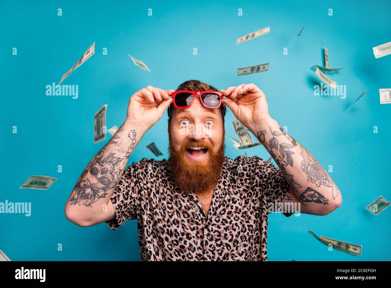 Photo of excited emotional macho guy luxury rich person dollars fall ...