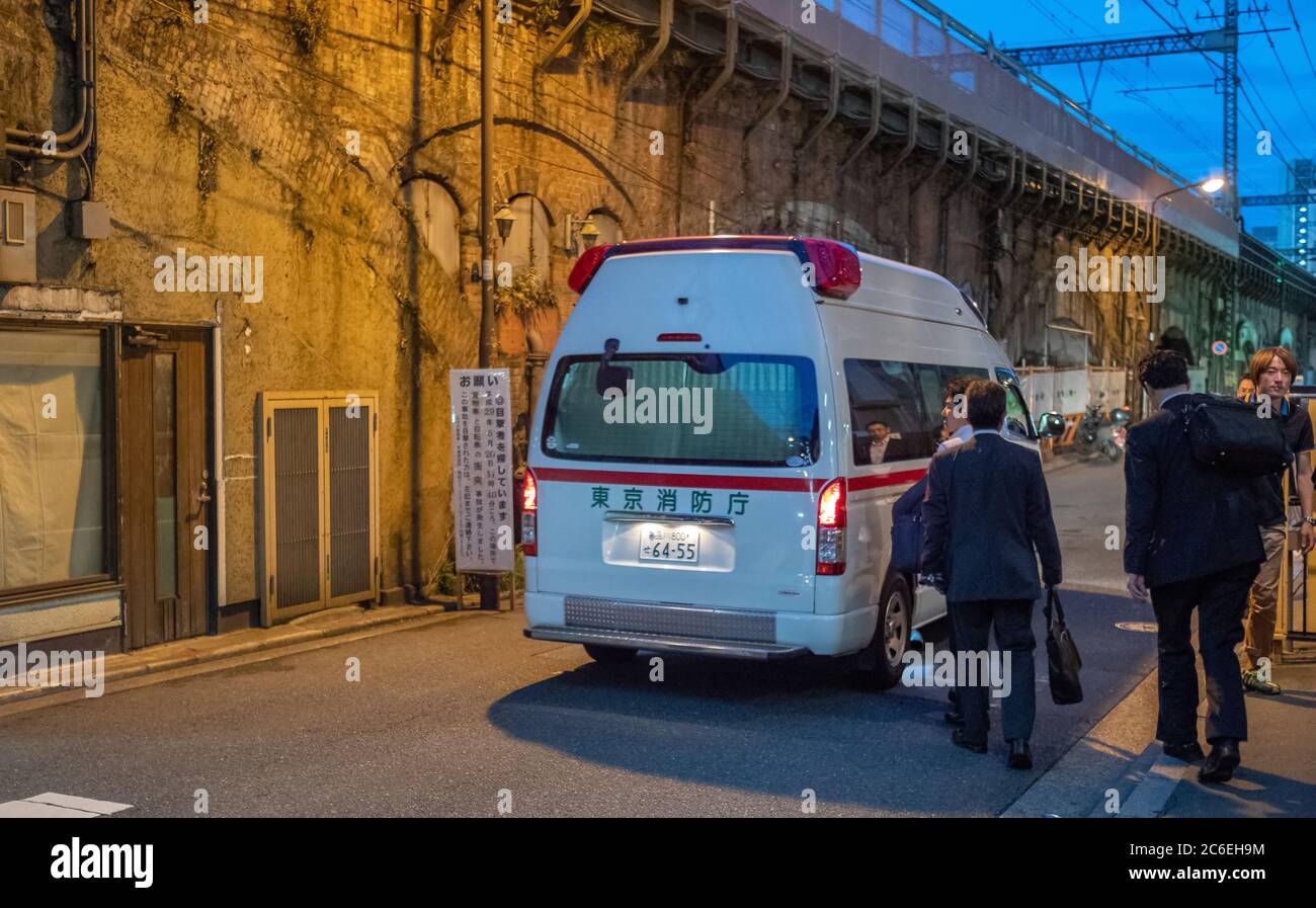 An ambulance at the back alley lane in Yurakucho district, Tokyo, Japan ...