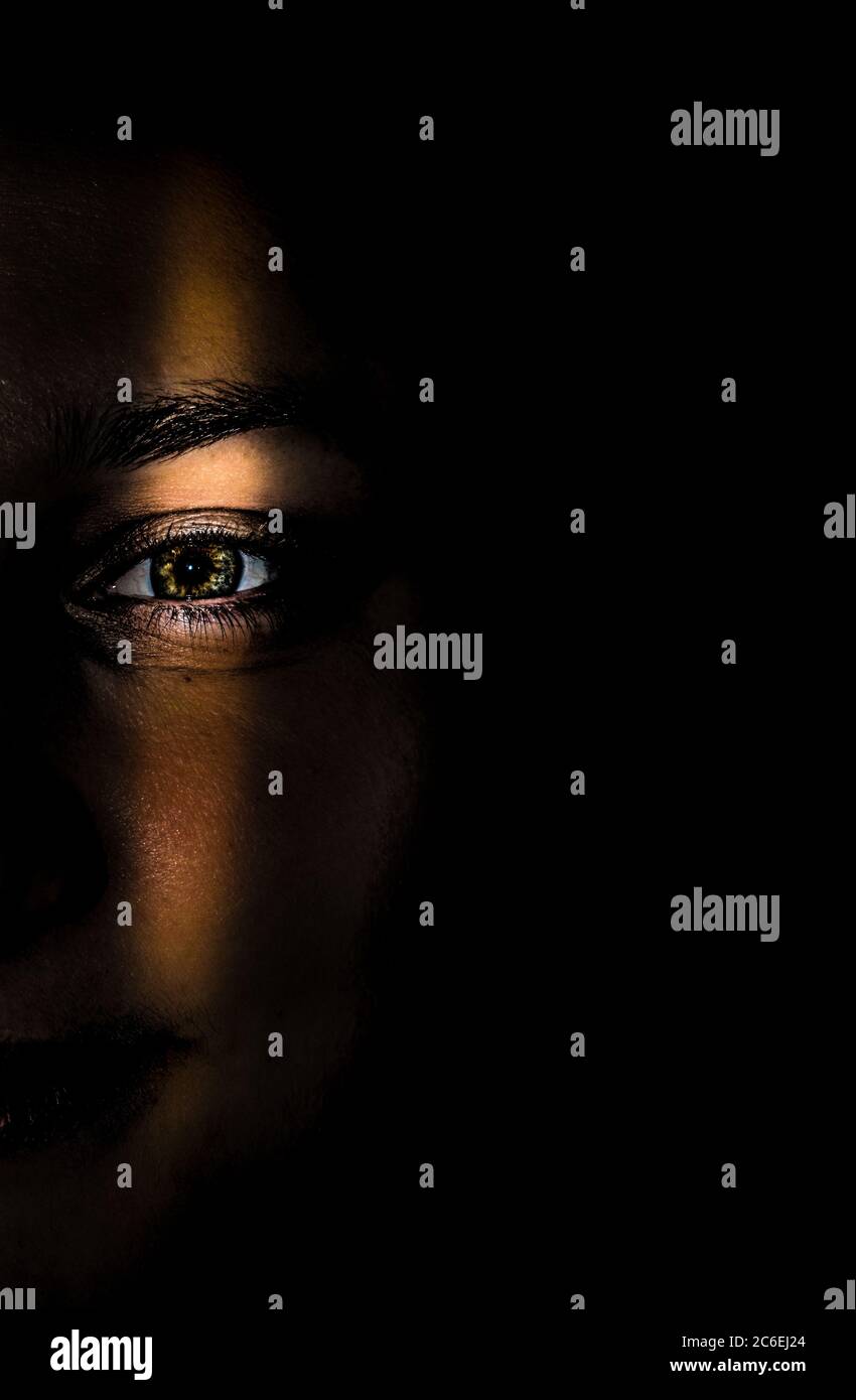 Face close up shadow hi-res stock photography and images - Alamy