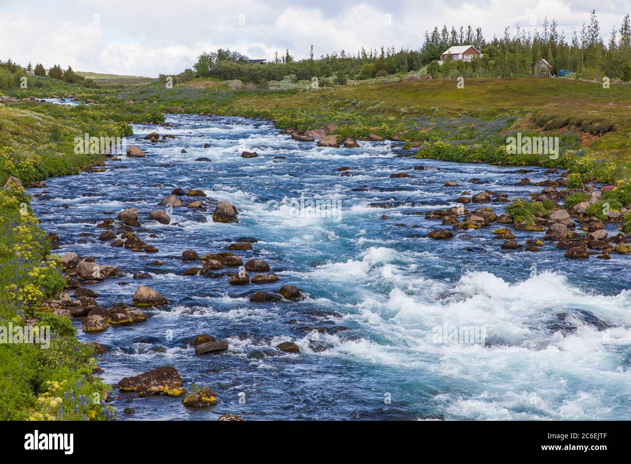 Icelandic landscape with blue water stream Stock Photo - Alamy