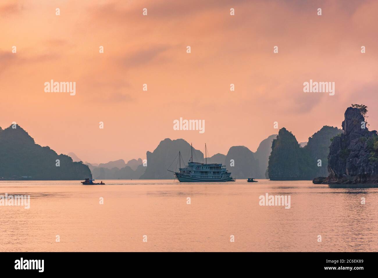 Colorful sunset over Ha Long Bay, Vietnam Stock Photo - Alamy