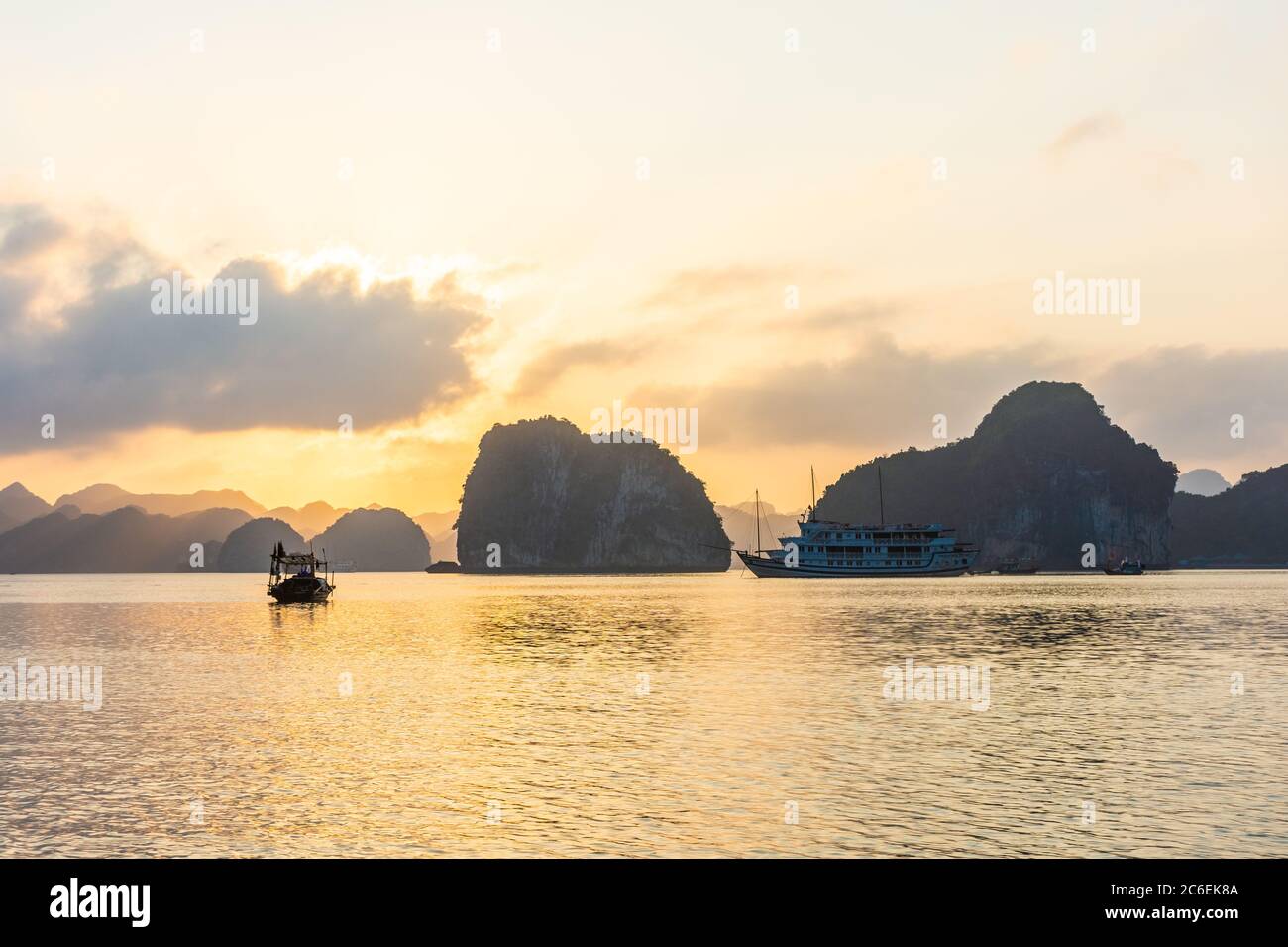 Colorful sunset over Ha Long Bay, Vietnam Stock Photo - Alamy