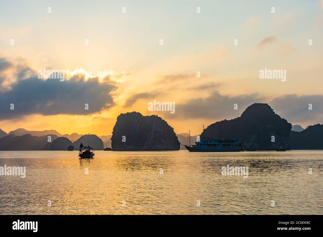 Colorful sunset over Ha Long Bay, Vietnam Stock Photo - Alamy