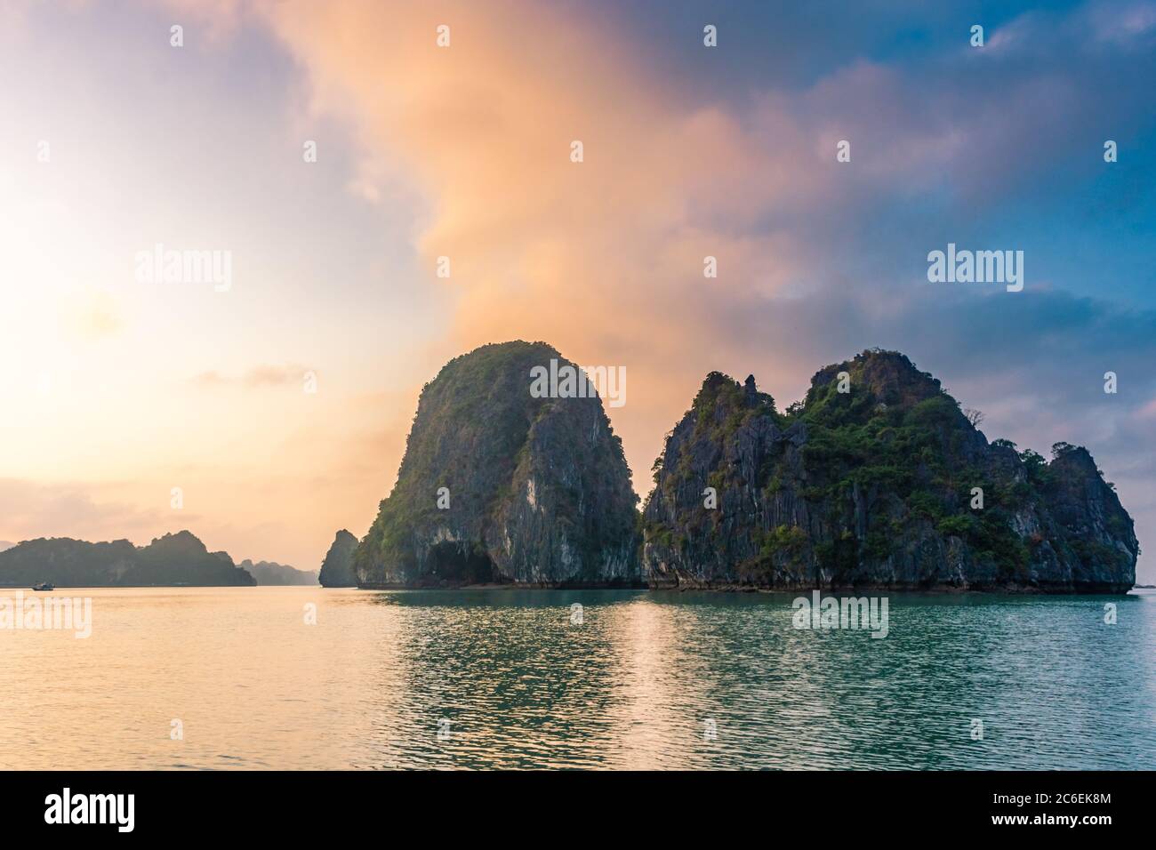 Colorful sunset over Ha Long Bay, Vietnam Stock Photo - Alamy