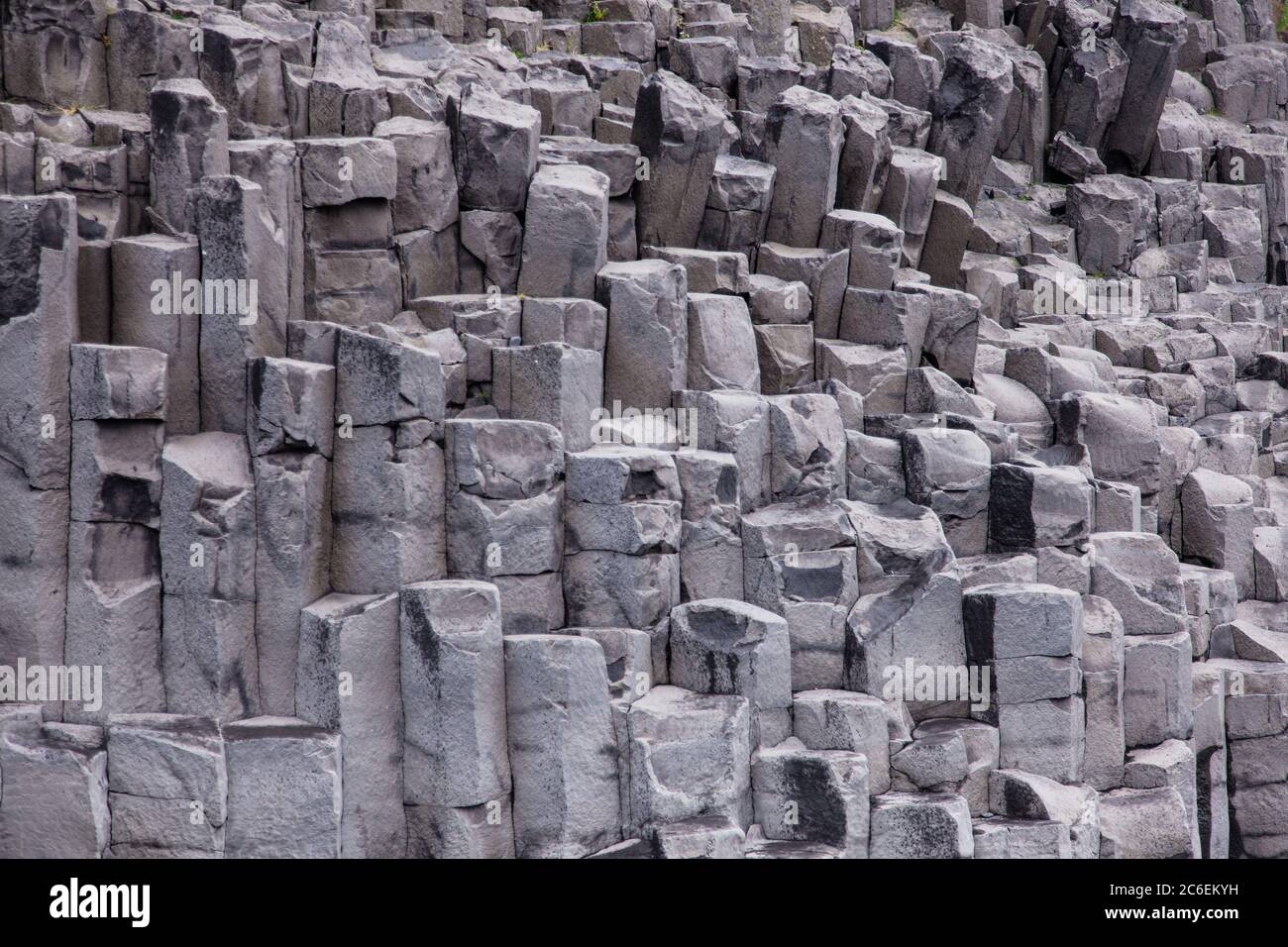 The black sand beach with unusual rock formation in Vik - Iceland Stock ...