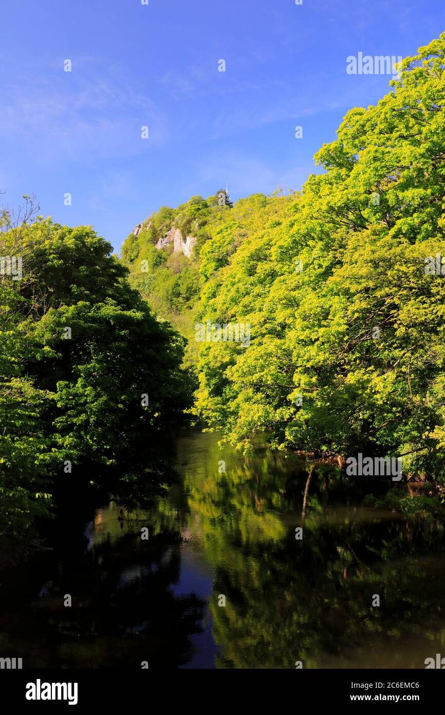 Spring view of the river Derwent and Riber Castle in the market town of ...