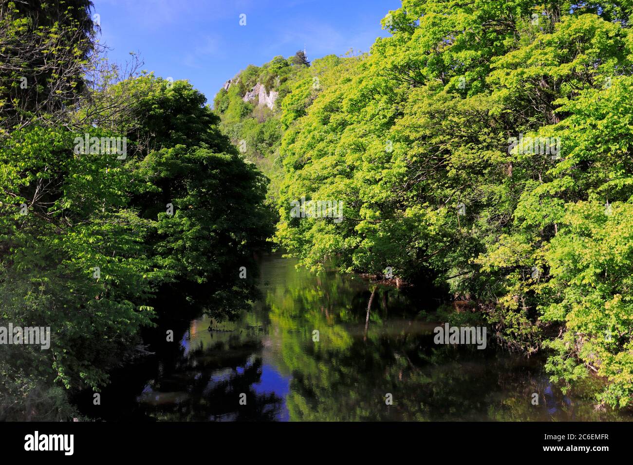 Spring view of the river Derwent and Riber Castle in the market town of ...