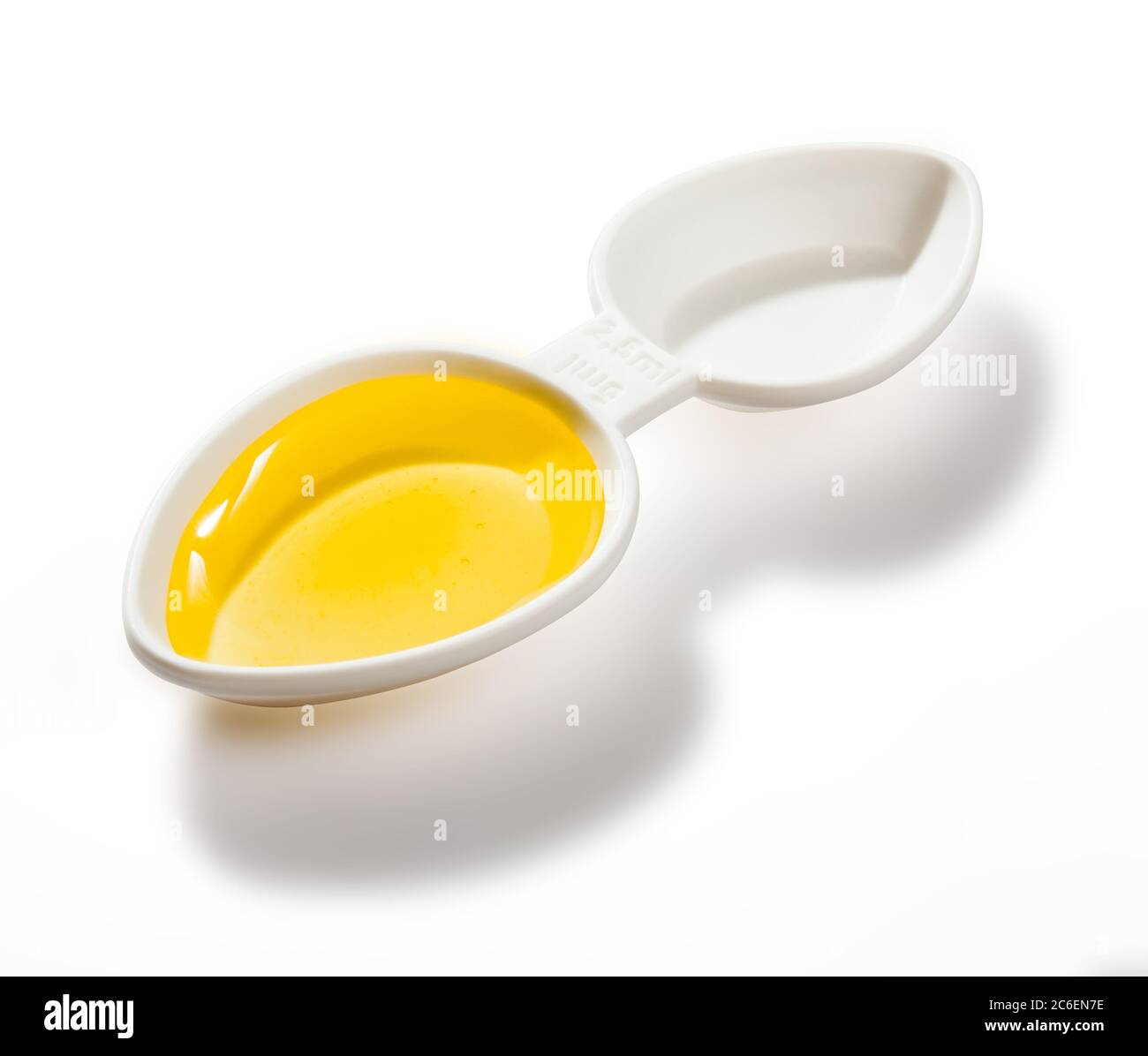 Medicine dosing spoon Stock Photo - Alamy