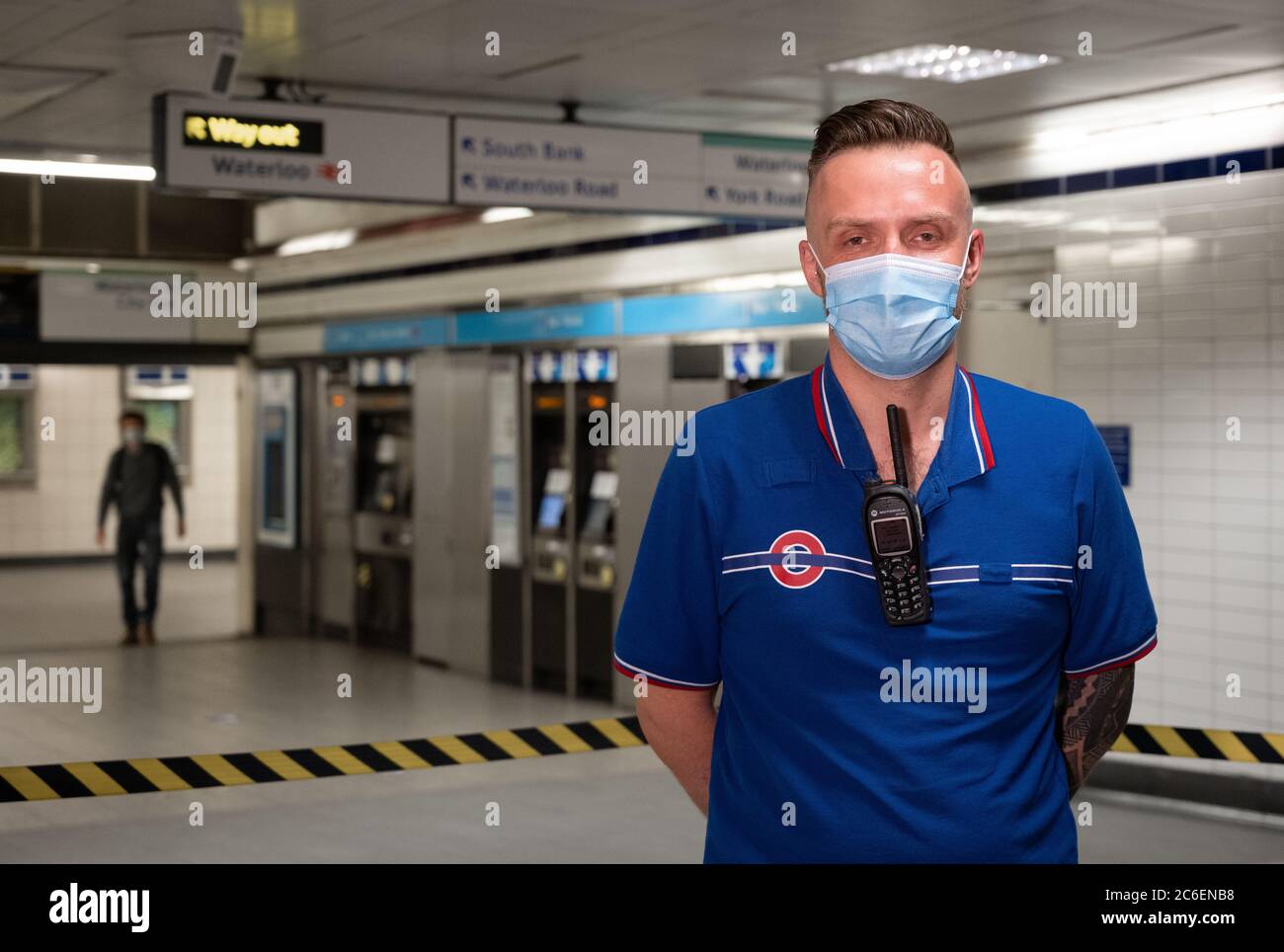 Transport for London staff wearing face masks on the London Underground ...