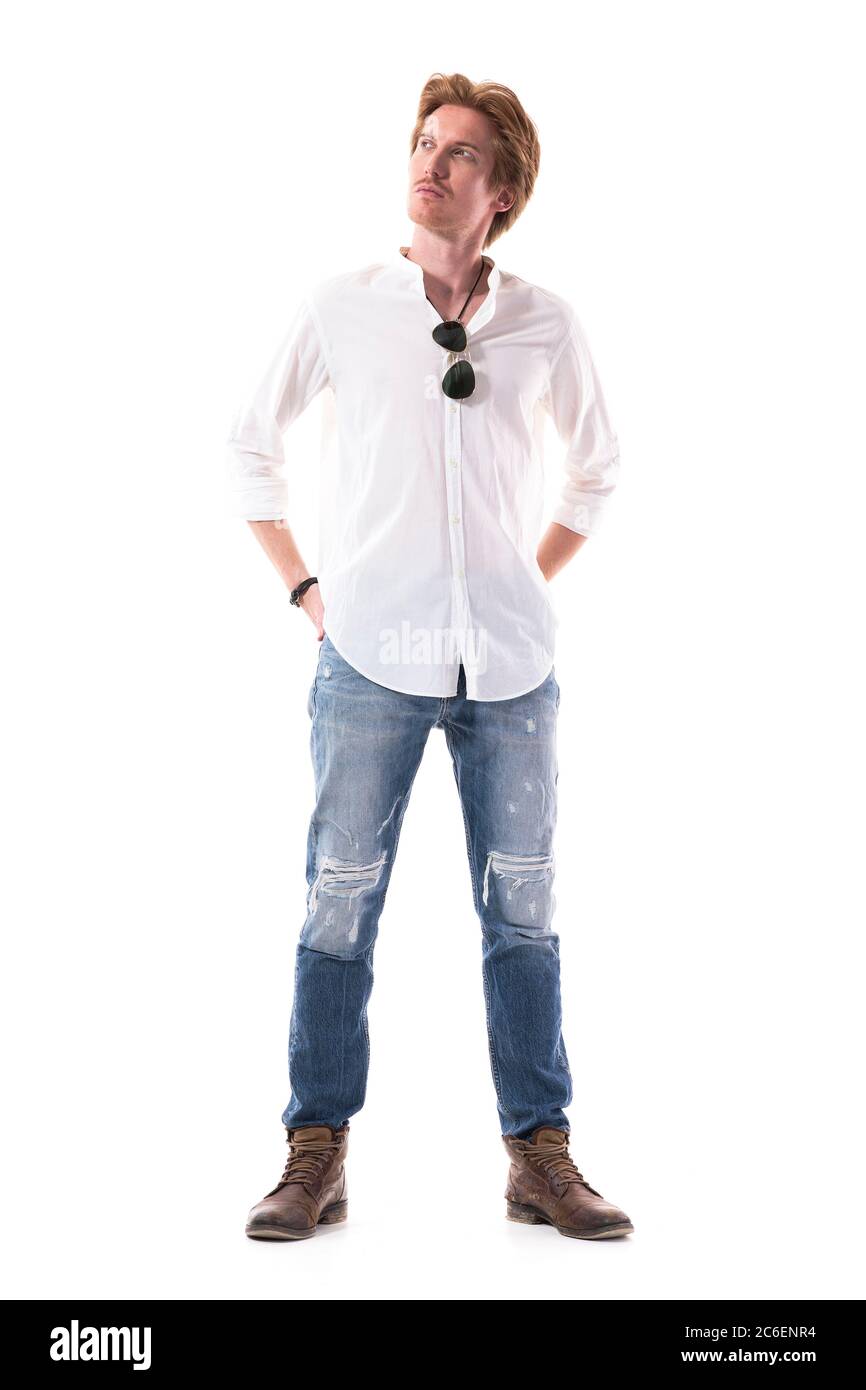 Thinking young stylish man looking up planning mindful with hands ...