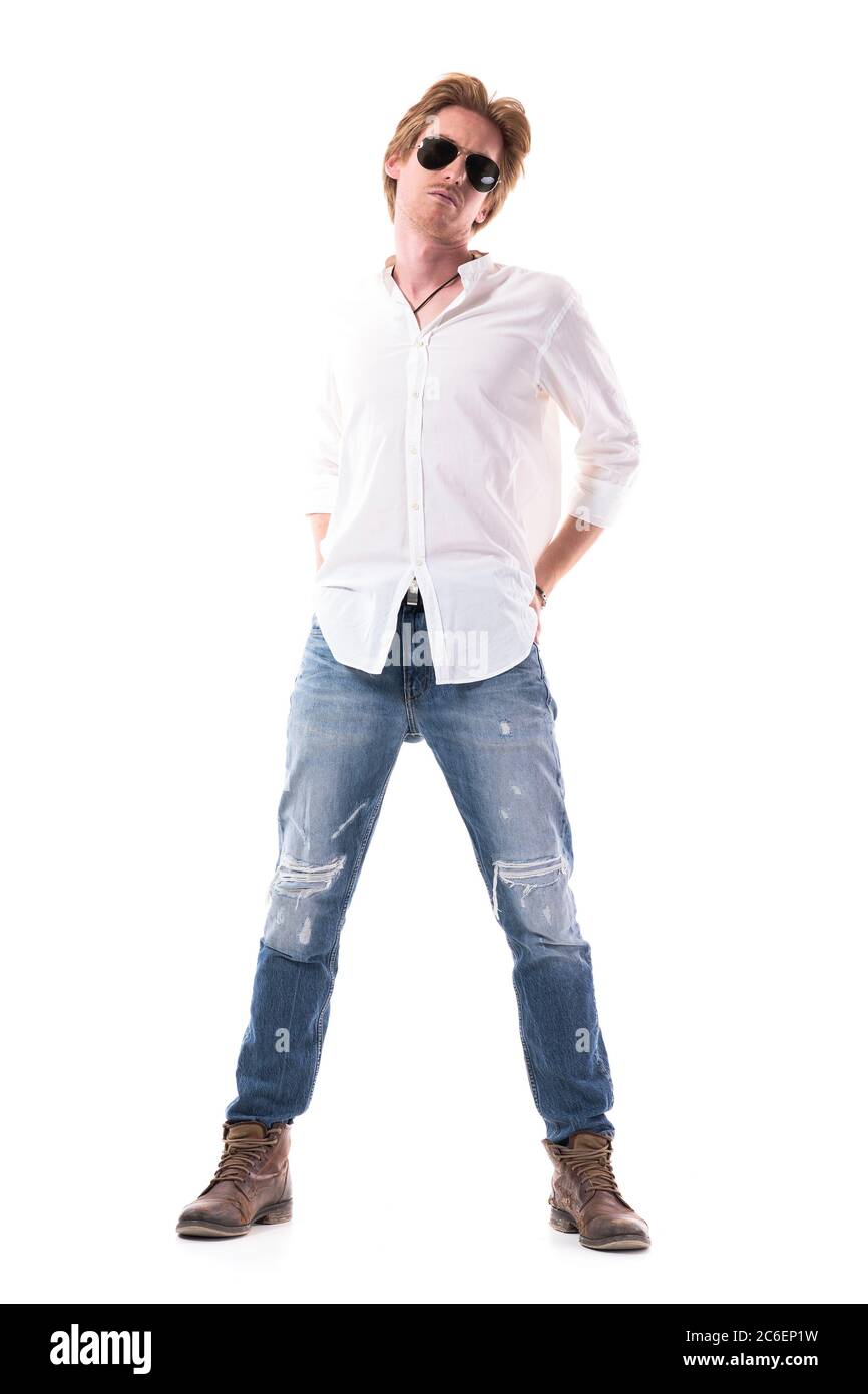 Ginger handsome slim young stylish man with sunglasses posing with ...