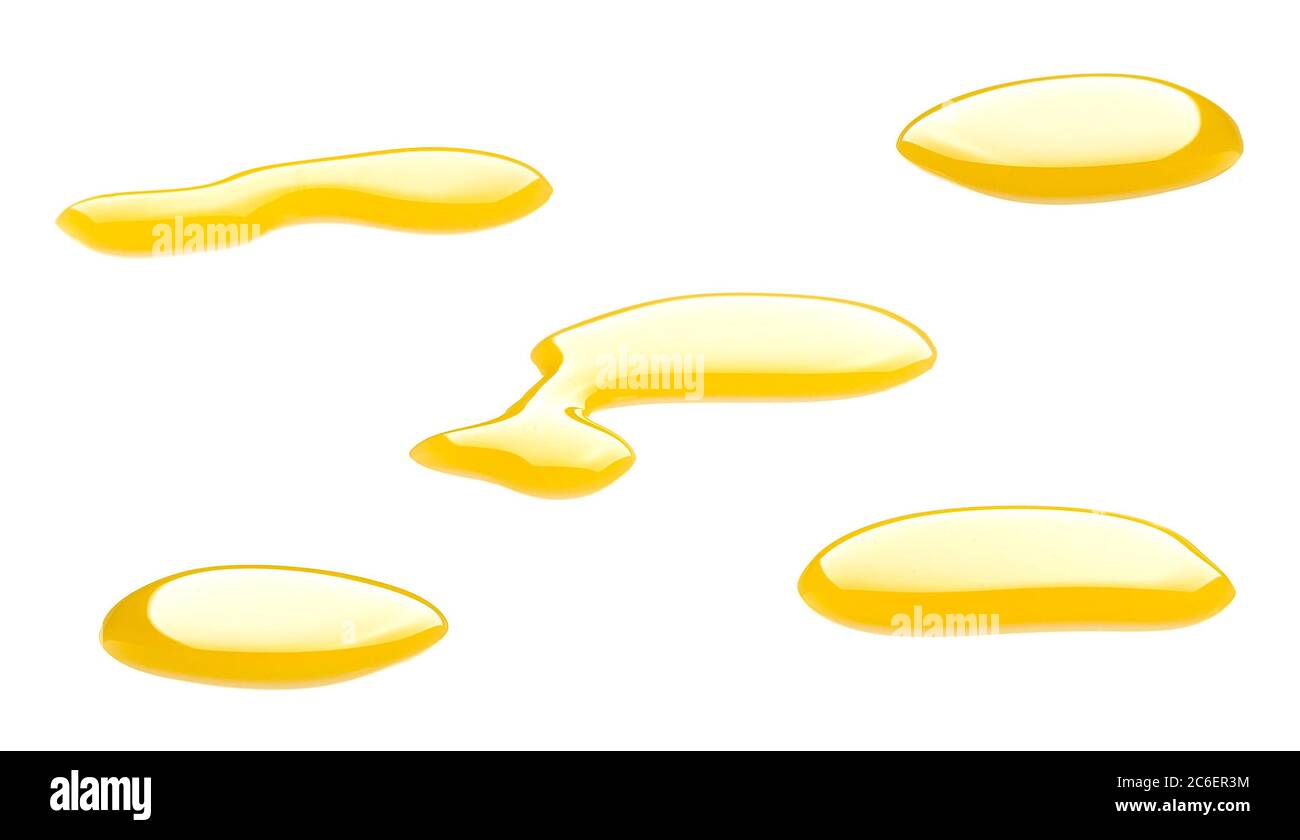 Yellow syrup drops isolated on white background Stock Photo - Alamy