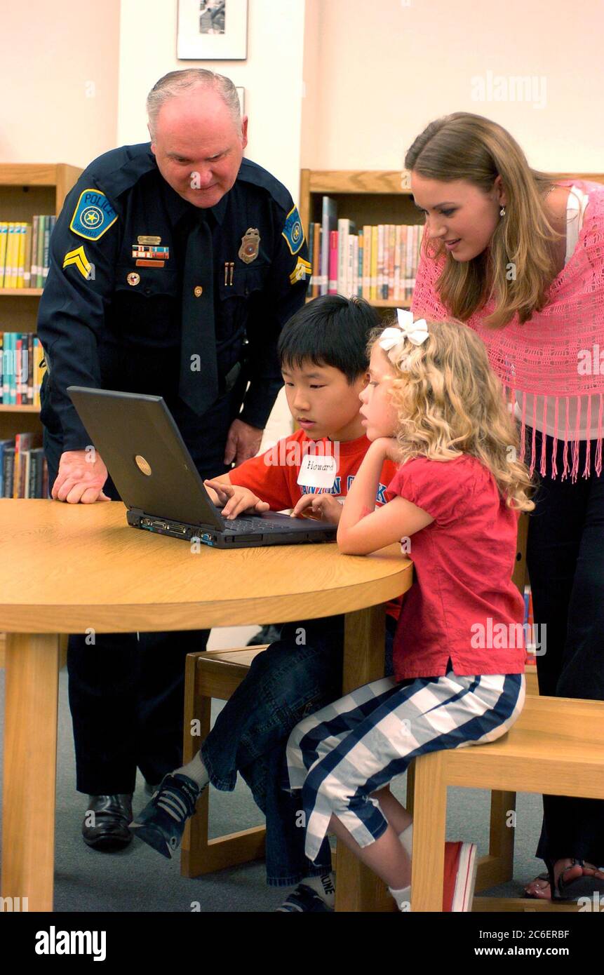 Austin, Texas USA, April 19 2005: Second-grade children look at ...