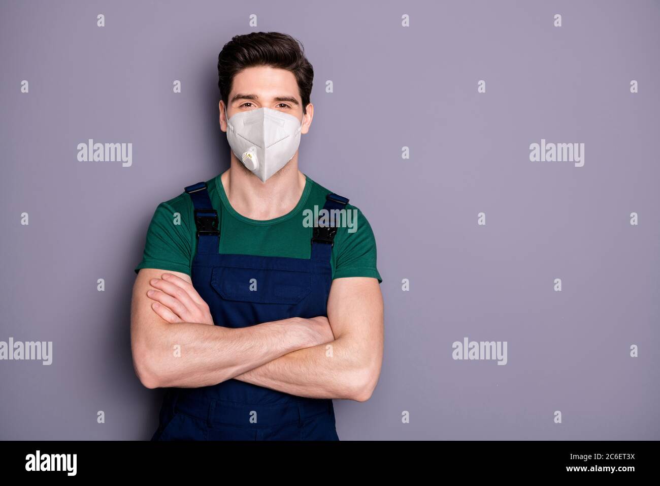 Portrait of his he attractive healthy guy workman wearing safety n95 ...