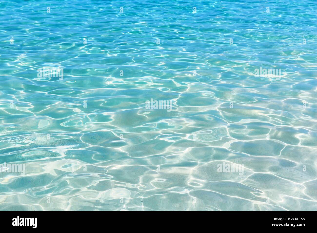 Shining blue water ripple background. Surface of water in swimming pool ...