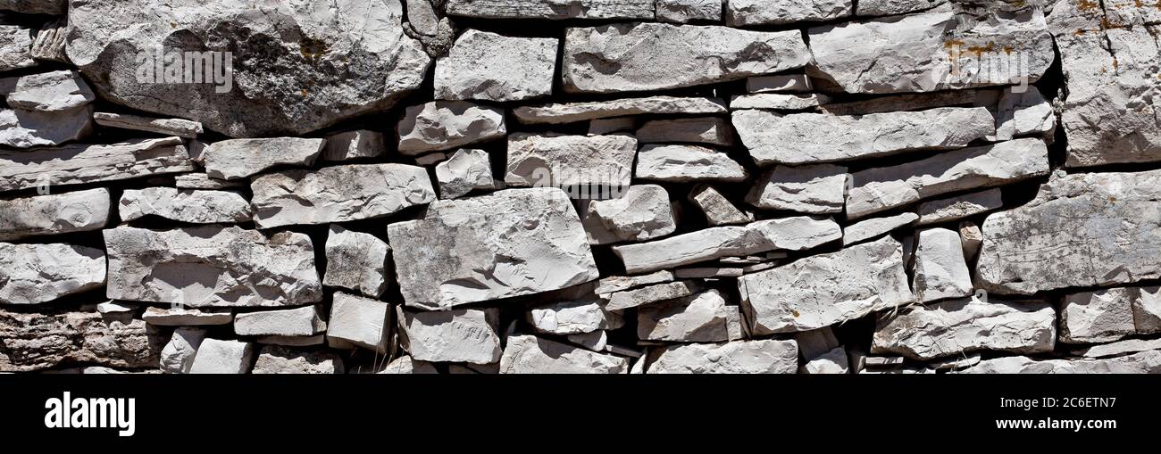 Typical mediterranean stone wall texture Stock Photo - Alamy