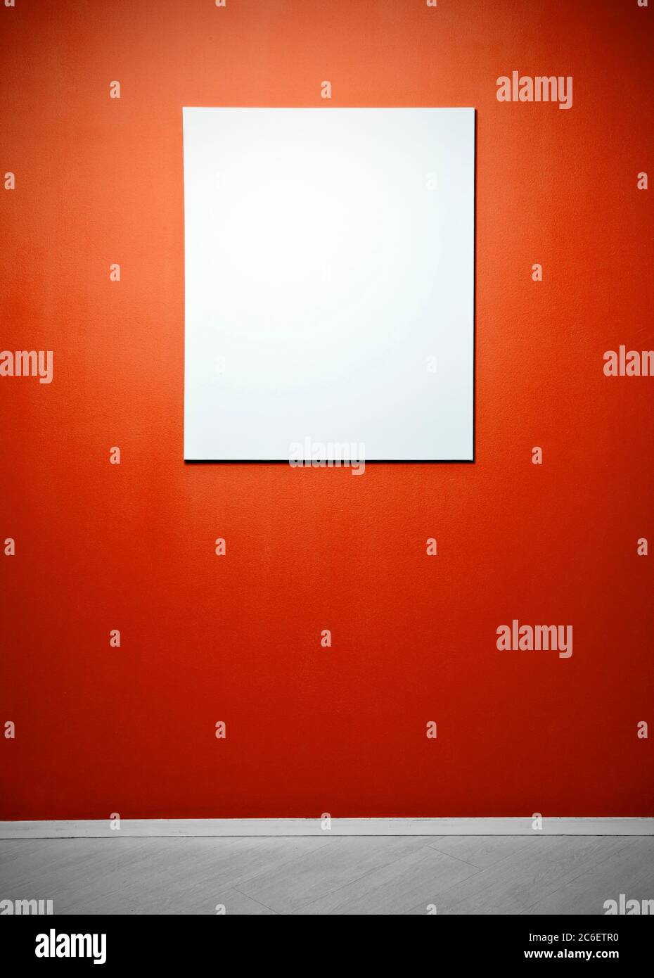 Blank picture poster in a red gallery wall Stock Photo - Alamy