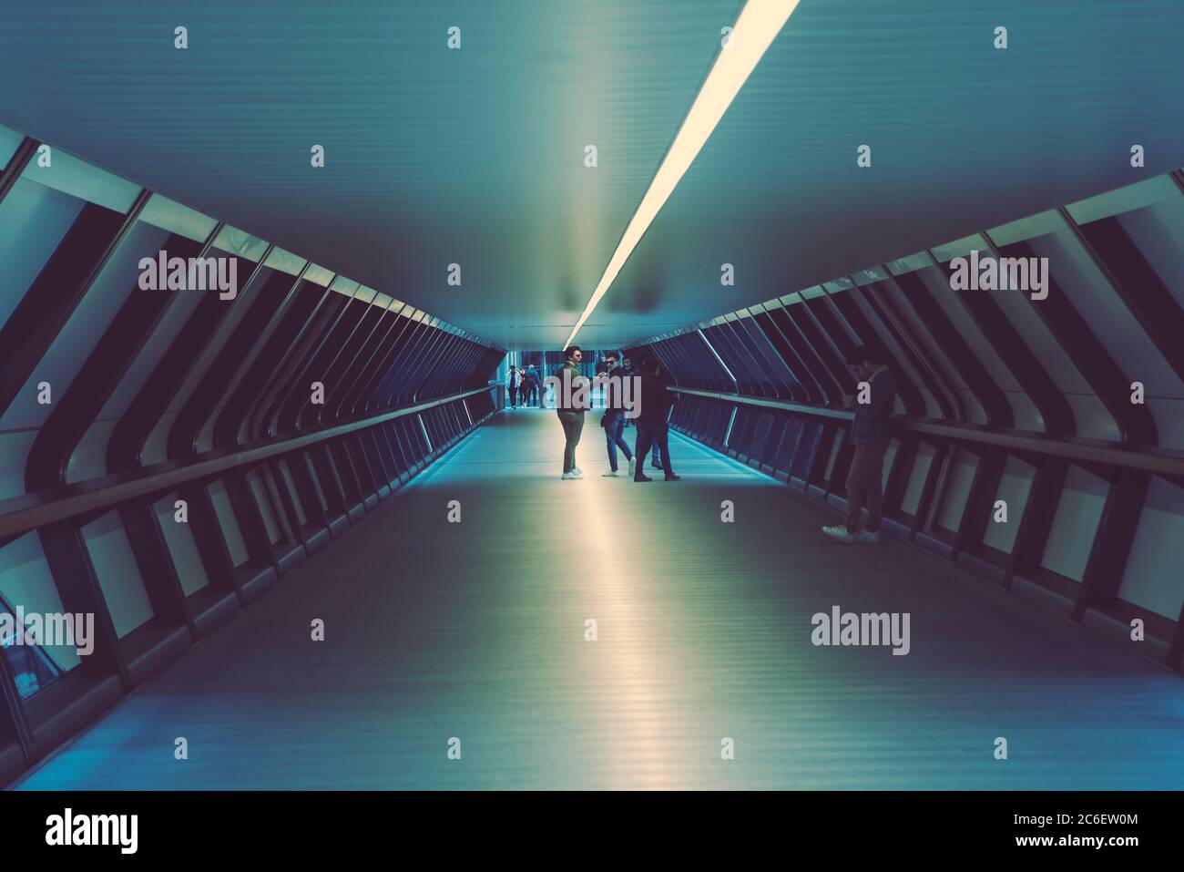 People in a pedestrian covered walkway.modern architecture ...