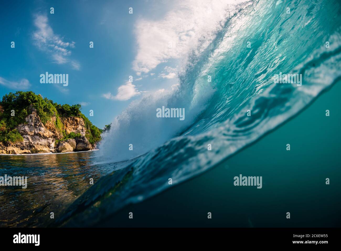 Perfect barrel wave in ocean. Breaking wave and sun light Stock Photo ...