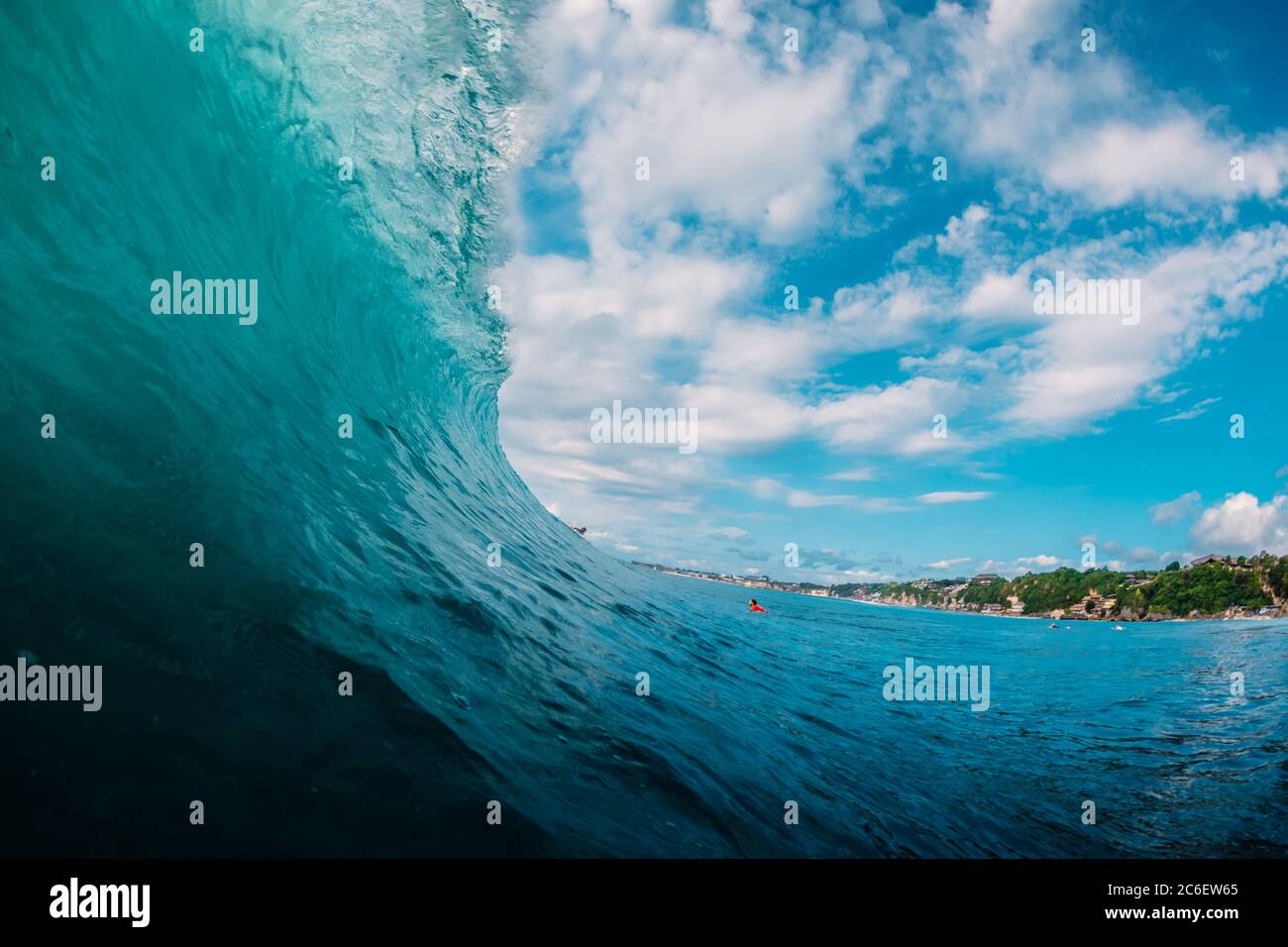 Perfect barrel wave in ocean. Breaking wave and sun light Stock Photo - Alamy