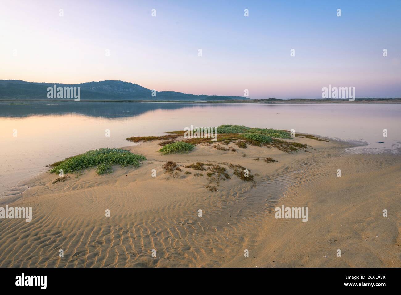 Sandbar with ripples caused by water in the estuary near the Corrubedo ...
