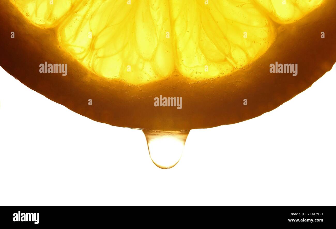 Lemon slice with a water droppings. Macro studio shot Stock Photo - Alamy