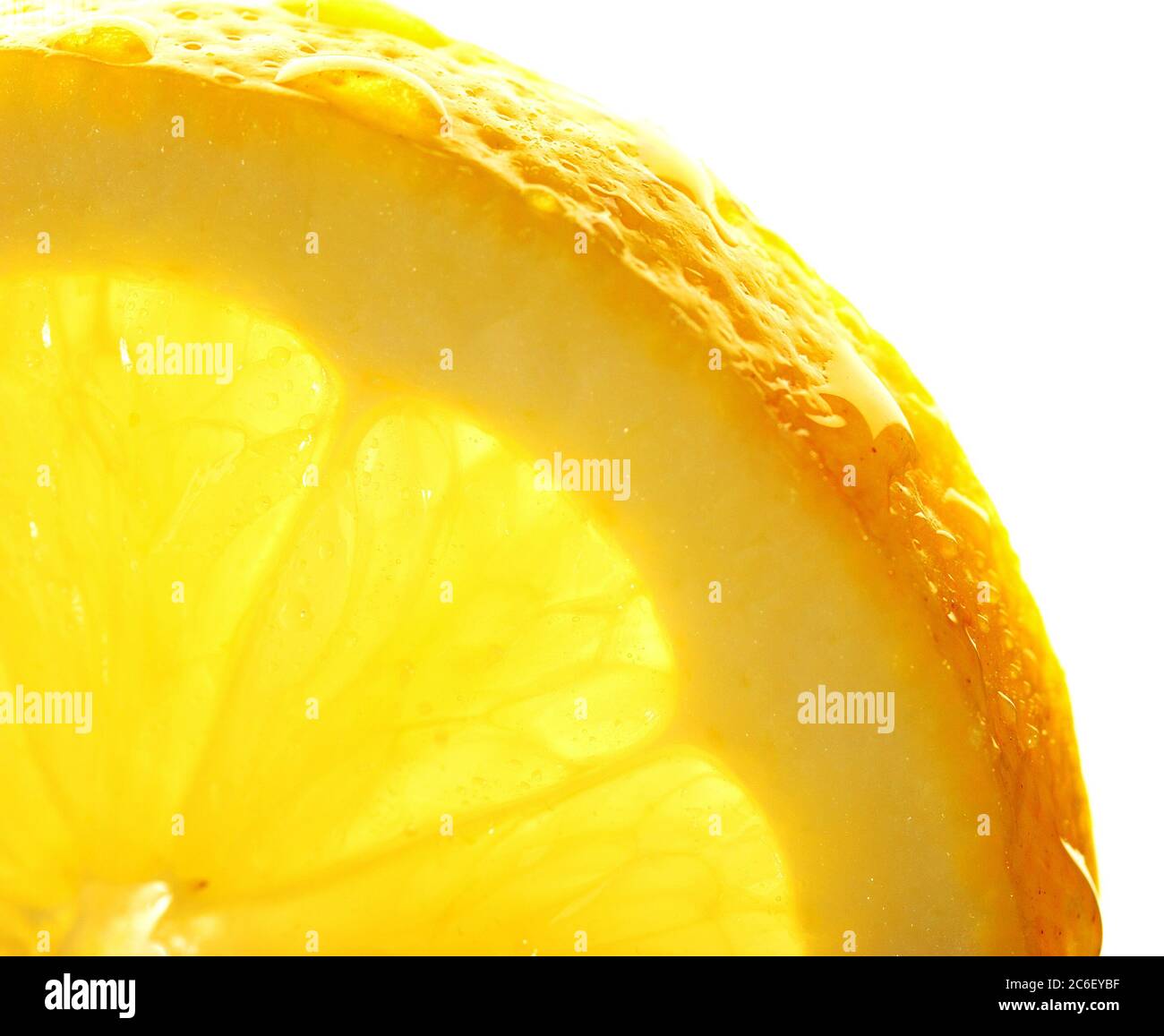 Lemon slice with a water droppings. Macro studio shot Stock Photo - Alamy