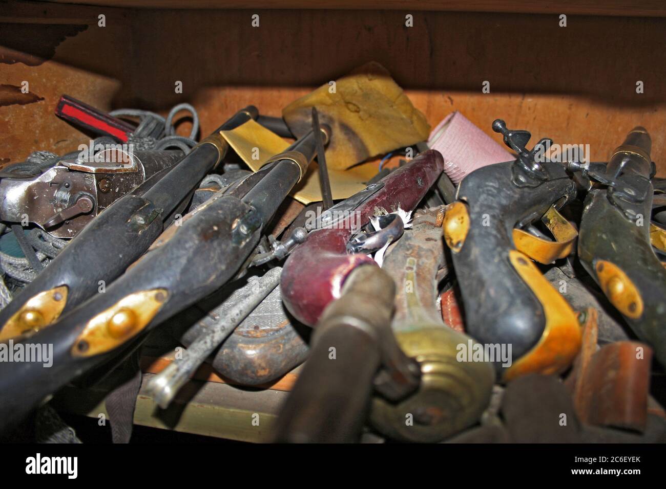 Pile of old vintage guns Stock Photo - Alamy