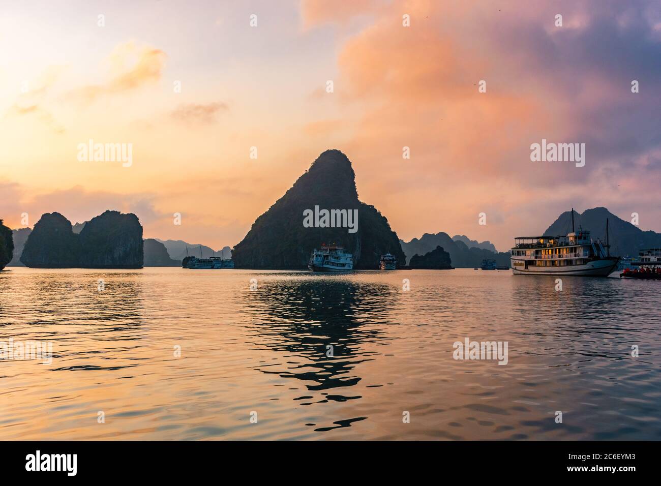 Amazing sunset over Ha Long Bay, Vietnam Stock Photo - Alamy
