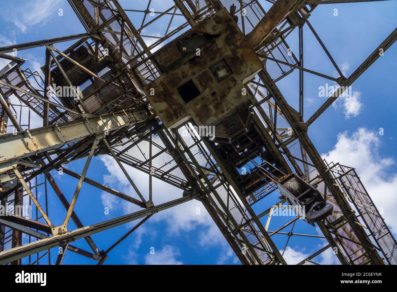 old metal tower crane in a steelworks Stock Photo - Alamy
