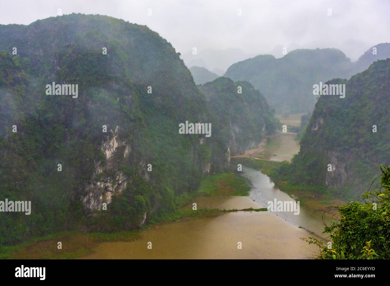 Landscape of Tam Coc during heavy rain, Vietnam Stock Photo - Alamy