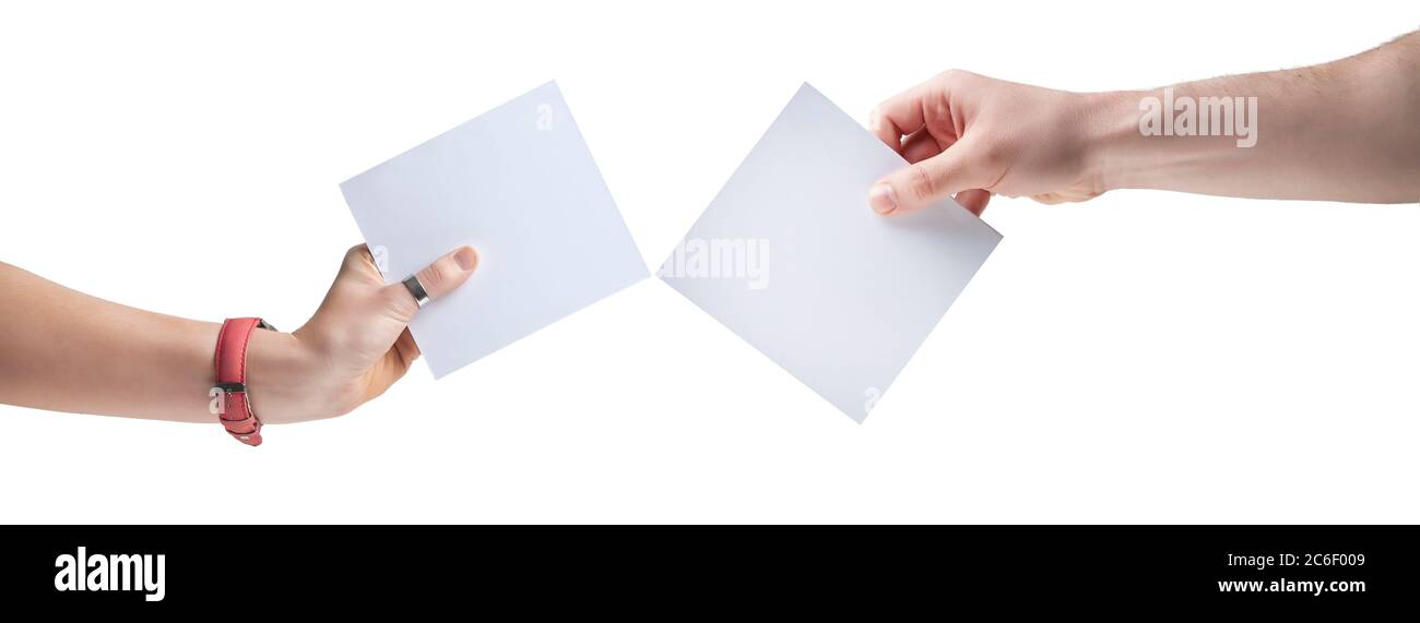 Hands holding, delivering blank piece of paper Stock Photo - Alamy