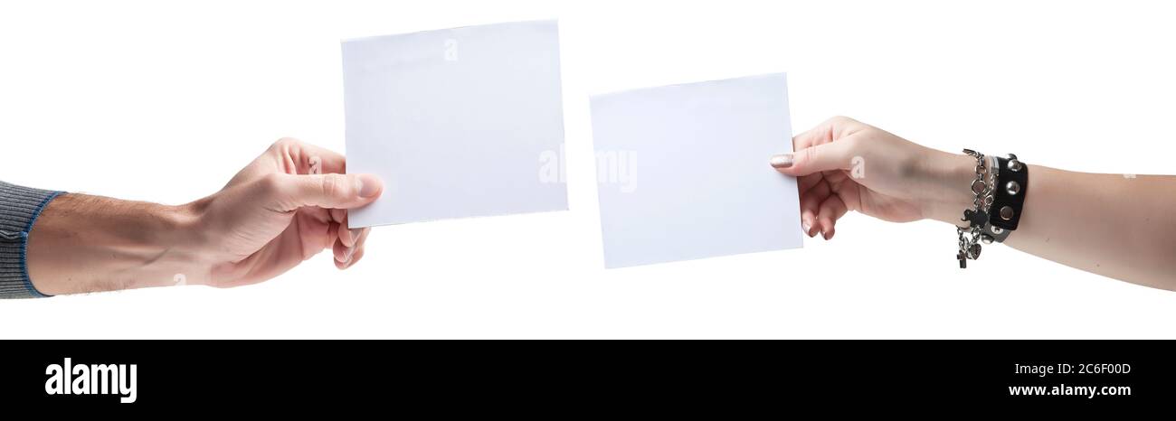 Hands holding, delivering blank piece of paper Stock Photo - Alamy