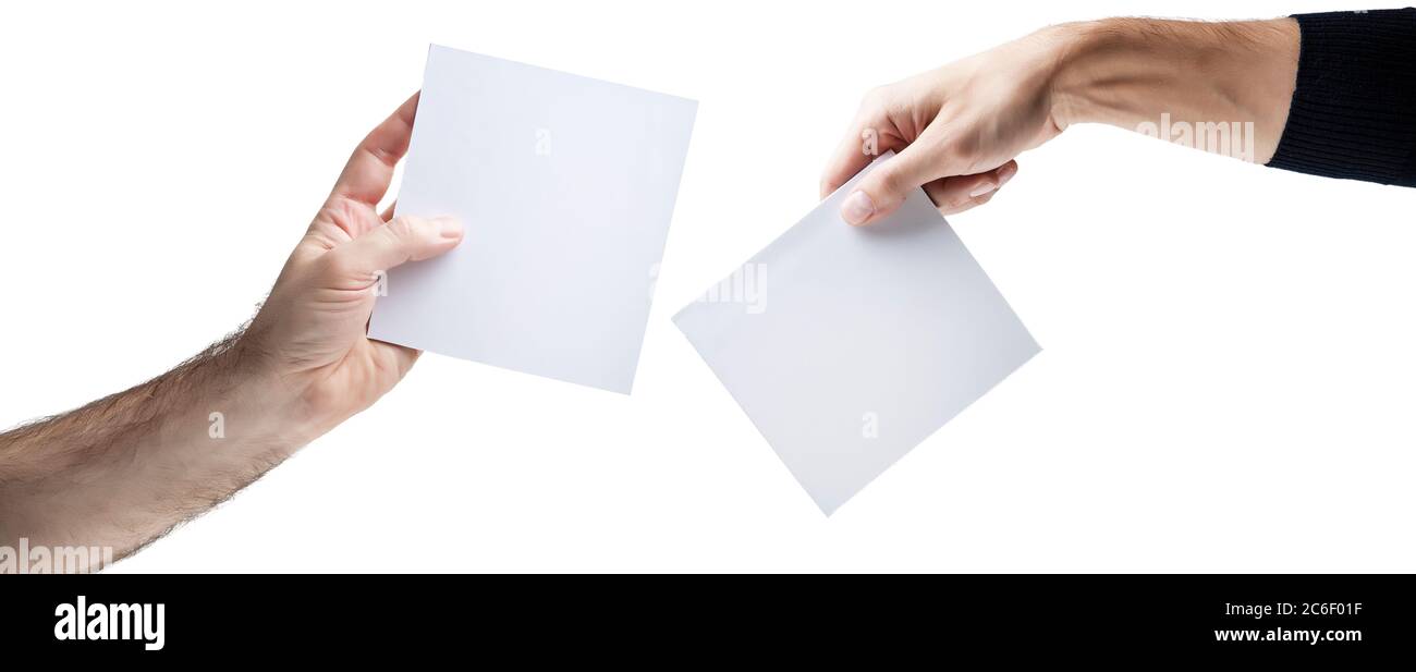 Hands holding, delivering blank piece of paper Stock Photo - Alamy