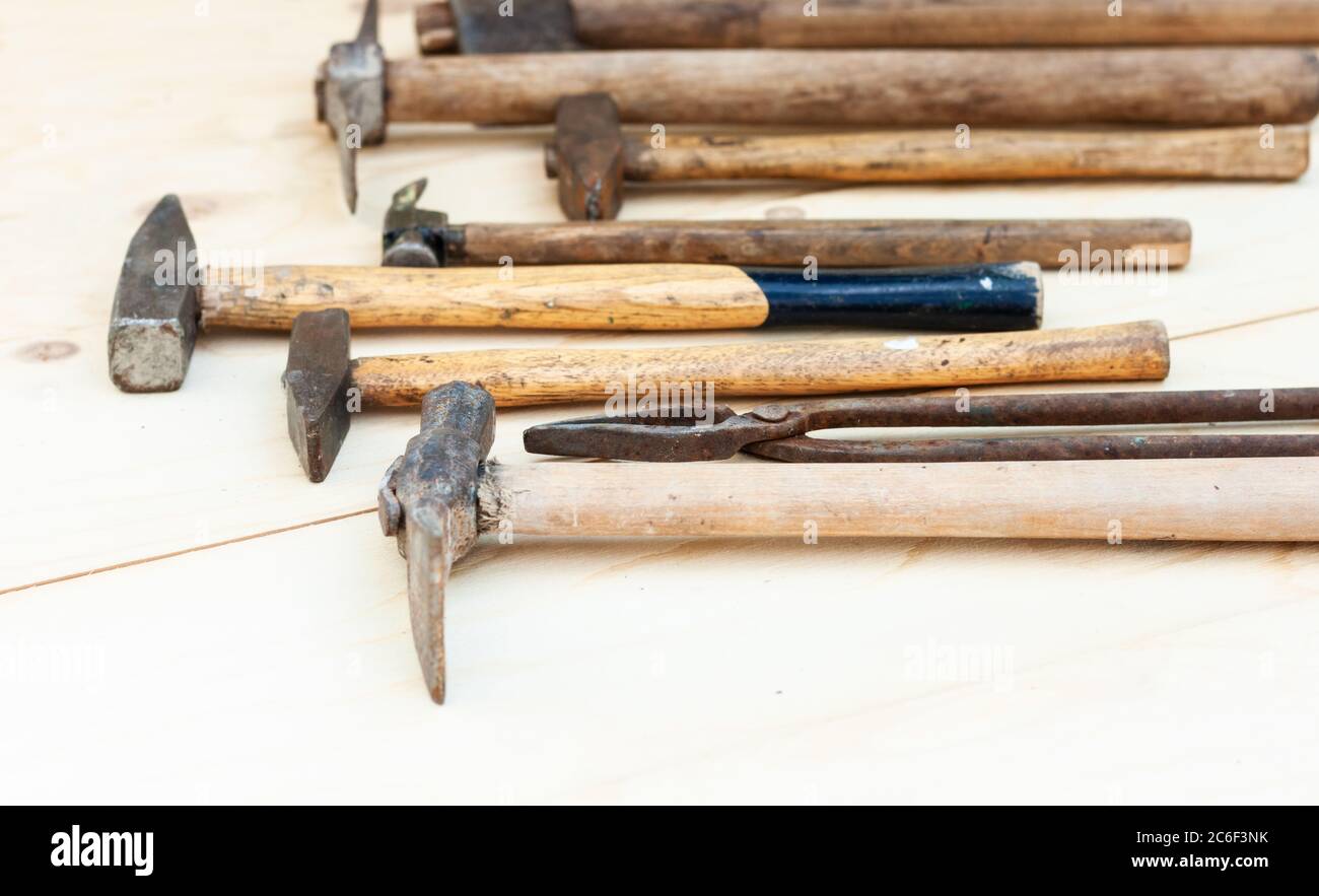 Set of vintage well used hand construction tools for handyman, hammers ...