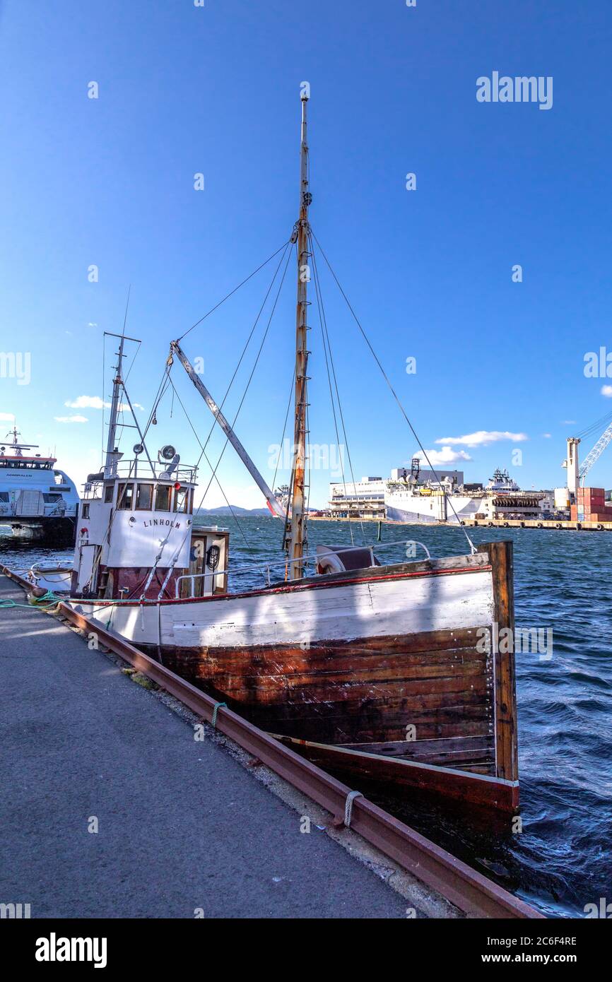 Veteran old prawn trawler Linholm (built 1920) moored nearby a small ...