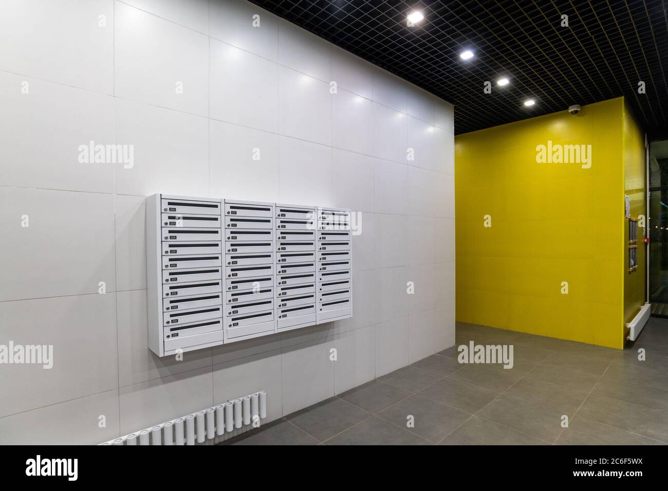Mailboxes on the wall in an apartment building Stock Photo - Alamy