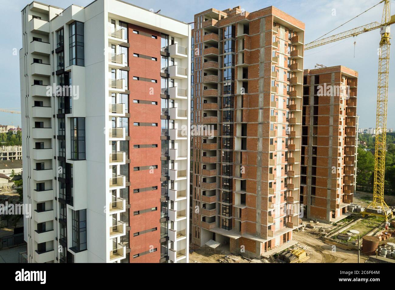 High-rise residential apartment buildings and tower crane under ...